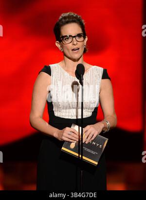Tina Fey presents the award for outstanding variety special (live) to Lorne Michaels during the ...