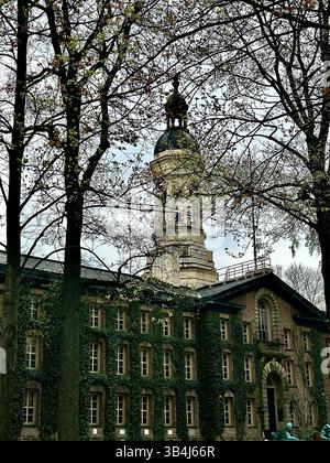 A historic view of Nassau Hall at Princeton University, an iconic ...