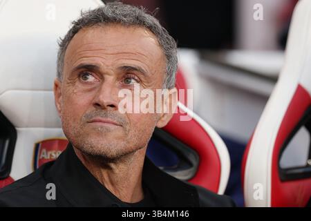 Paris Saint-Germain manager Luis Enrique salutes fans after the Club ...