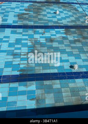Dirty water in the hotel's summer pool. Cleaning the pool by water ...
