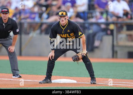 Kennesaw St. infielder Donovan Cash (25) throws against LSU during an ...