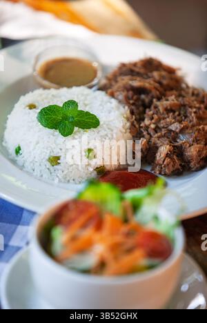 Portion of boiled rice garnish Stock Photo - Alamy