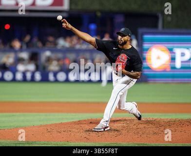 Miami Marlins starting pitcher Sandy Alcantara throws to the plate ...