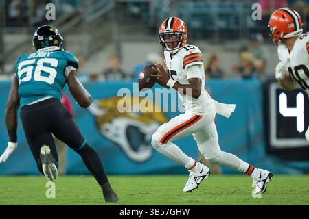 Cleveland Browns quarterback Joshua Dobbs jogs during an NFL football ...