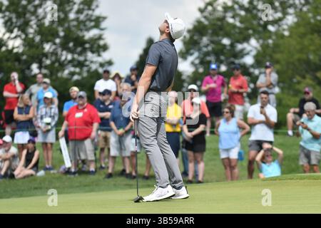 Sam Burns reacts after missing a putt on the 14th hole during the final ...