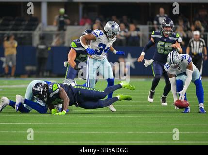 Dallas Cowboys safety Tyler Coyle (39) runs onto the field during an ...