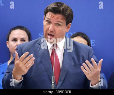 FILE - Florida Gov. Ron DeSantis gestures as he and Lt. Gov. Jeanette ...