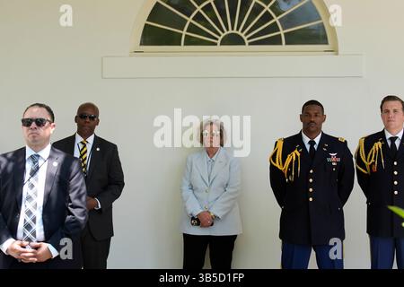White House Chief of Staff Susie Wiles, right, stands as President ...