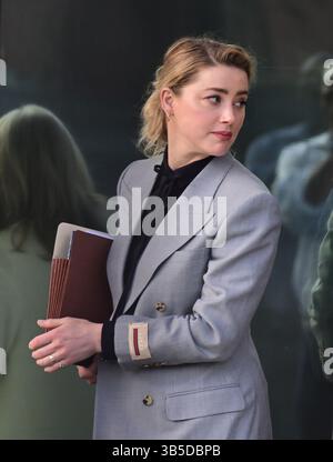Amber Heard departs after her trial recessed for the day at the Fairfax ...