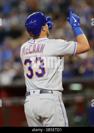 New York Mets James McCann (33) bats during an MLB Spring Training game ...