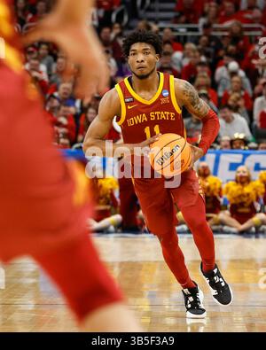 Iowa State guard Tyrese Hunter (11) goes to the basket between Oklahoma ...