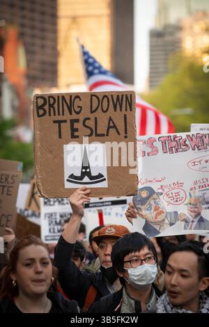 Anti-Elon Musk sign at a protest rally in Boise Idaho on February 17 ...