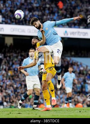 Josko Gvardiol of Manchester City heads on goal during the Premier ...