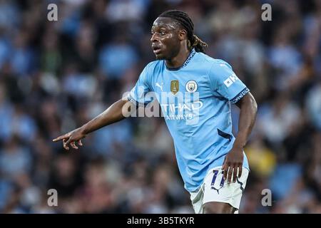Jeremy Doku of Manchester City gives his team instructions during the ...