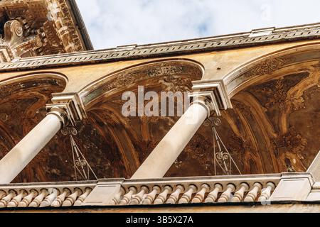 Elegant Renaissance loggia with arched columns and ornate ceiling ...