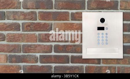 Modern Intercom Panel on Brick Wall Stock Photo - Alamy
