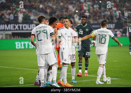 Mexico forward Roberto Alvarado (25) kicks the ball in front of ...