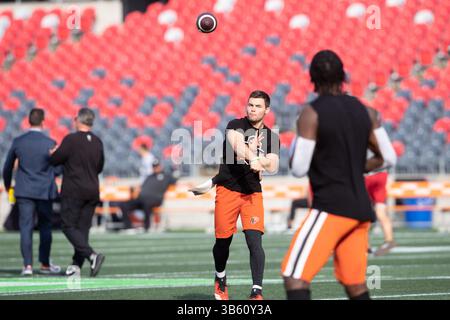 B.C. Lions quarterback Nathan Rourke (12) gets a pass past Toronto ...