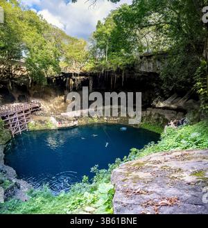 Cenote, a natural pit, or sinkhole with groundwater in Yucatan, Mexico ...