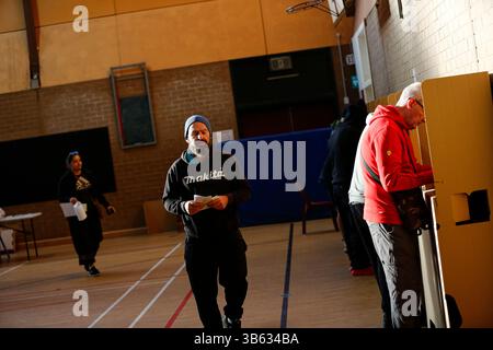 A voter walking in to cast their ballot at the Mickey Cafagna Community ...