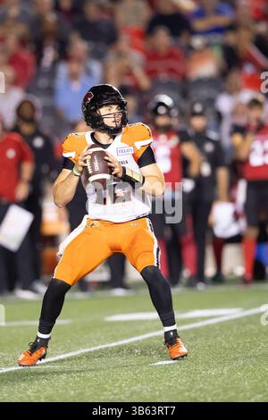 (12) Nathan Rourke of the BC Lions sets to throw the ball during the ...