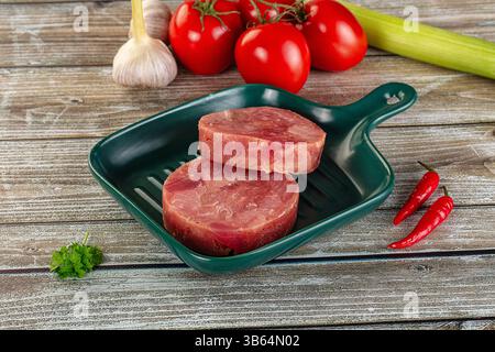 Raw round tuna fish uncucked fillet Stock Photo - Alamy