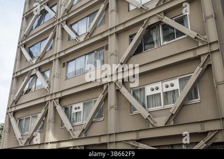 Building with visible steel reinforcement for earthquake resistance ...