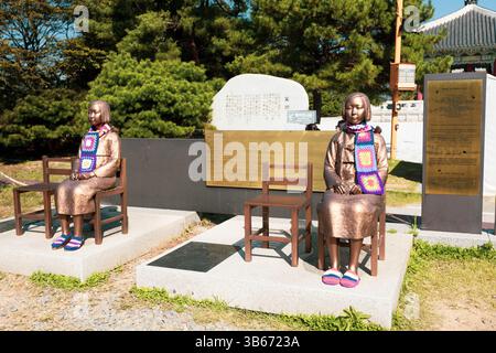 Bronze woman statues of peace at DMZ demilitarized zone in South Korea ...