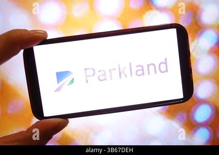 In this photo illustration, the Parkland Corp company logo is seen ...