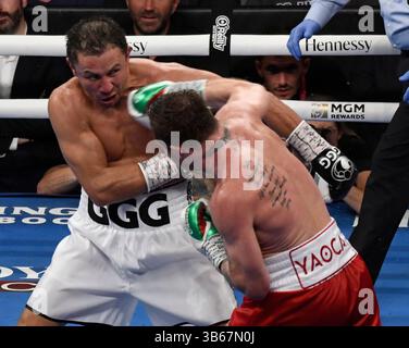 Canelo Alvarez (red trunks) goes 12 rounds with GGG at T-Mobile Arena ...