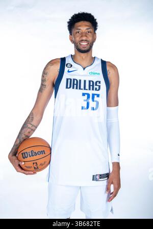 Dallas Mavericks center Christian Wood grabs a rebound in front of ...