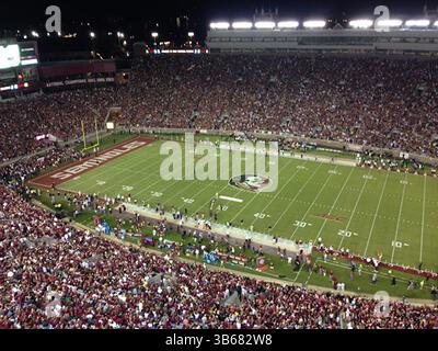 Florida State athletics director Michael Alford leaves the field after ...