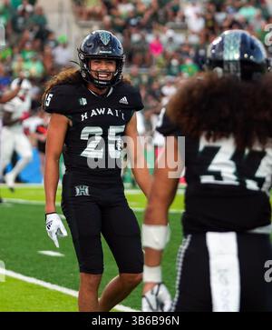 Hawaii Warriors defensive back Matagi Thompson (25) celebrates after ...
