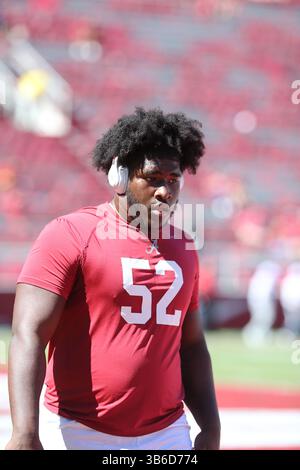 Alabama offensive lineman Tyler Booker poses on the carpet before first ...