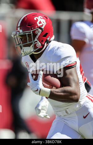 Alabama running back Jamarion Miller, right, runs past Missouri ...