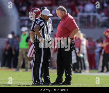 Arkansas coach Sam Pittman talks to his team during a time out against ...