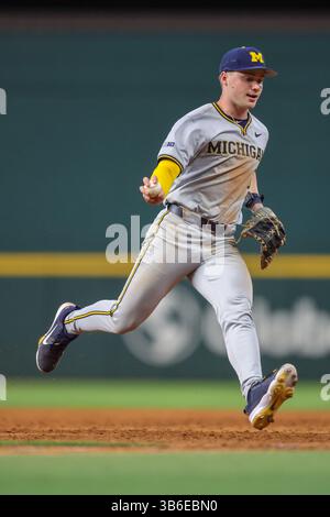 February 23, 2024: Dylan Stanton #9 Wolverines first baseman motions to ...