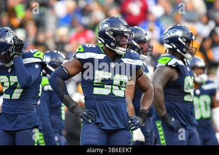 Seattle Seahawks linebacker Derick Hall runs a drill during the NFL ...