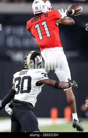 UNLV wide receiver Ricky White runs a drill at the NFL football ...
