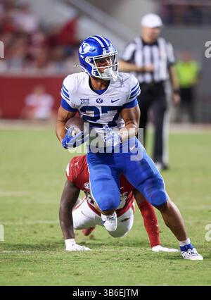 BYU running back LJ Martin (4) runs the football in for a touchdown ...