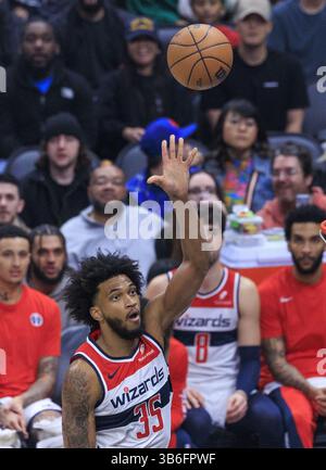 Washington Wizards' Marvin Bagley III, left, and Philadelphia 76ers ...