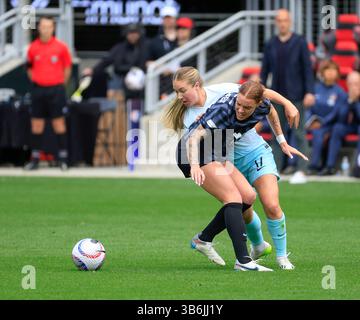 Washington Spirit midfielder Hal Hershfelt (17) is being examined by ...