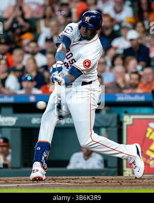 Houston Astros' Yordan Alvarez (44) hugs Jeremy Peña (3) after hitting ...
