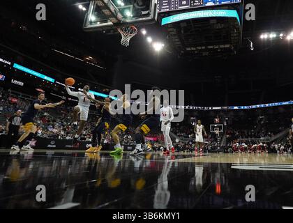 Cincinnati guard Day Day Thomas (1) drives the ball around Iowa State ...