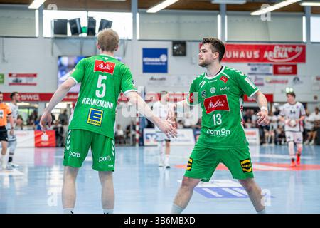 (L-R) Ian Weber (GWD Minden, #13), Mohab Abdelhak (THW Kiel, #48 ...