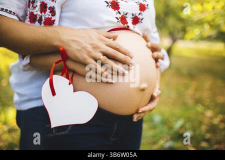 Pregnant woman holding paper with text about monkeypox virus, home ...