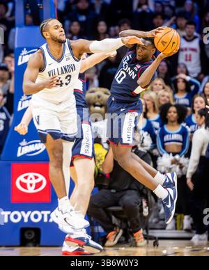 UConn guard Hassan Diarra (10) dribbles the ball as Providence guard ...
