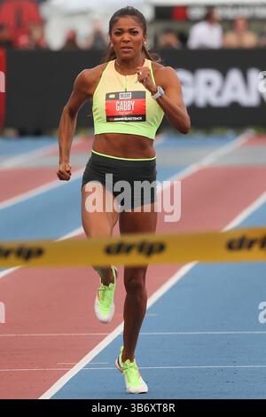 Gabby Thomas wins the 200 meters during the Grand Slam Track Miami at ...
