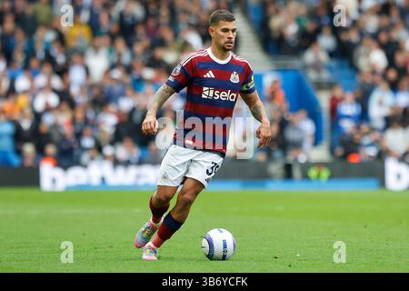 Bruno Guimaraes of Newcastle United in action with Matheus Nunes during ...