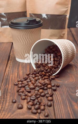 Paper bags with coffee cup on desk in office. Food delivery service ...